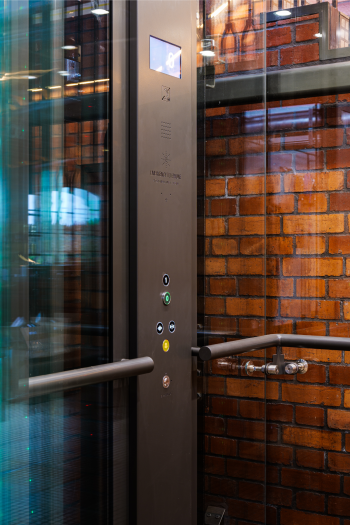 Bespoke glass passenger lift for the Creamery